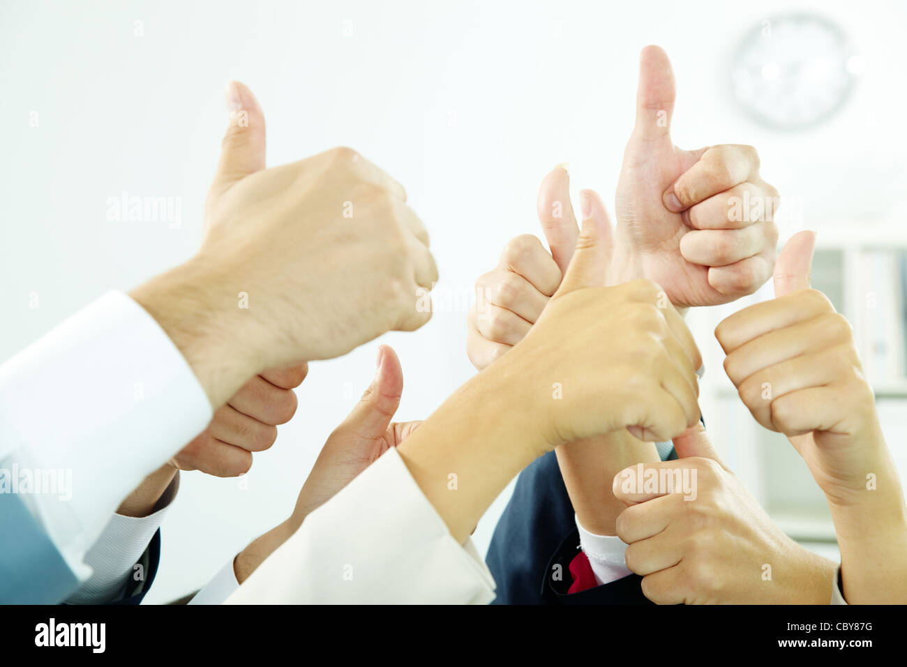 Image of several human hands showing thumbs up in isolation Stock Photo ...