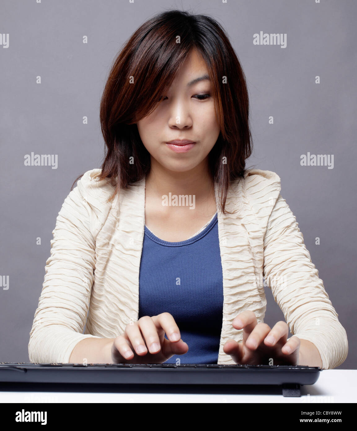 Office lady uses notebook computer Stock Photo - Alamy