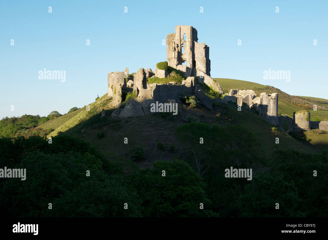 The great rugged ruins of an ancient Norman fortress dominate a ...