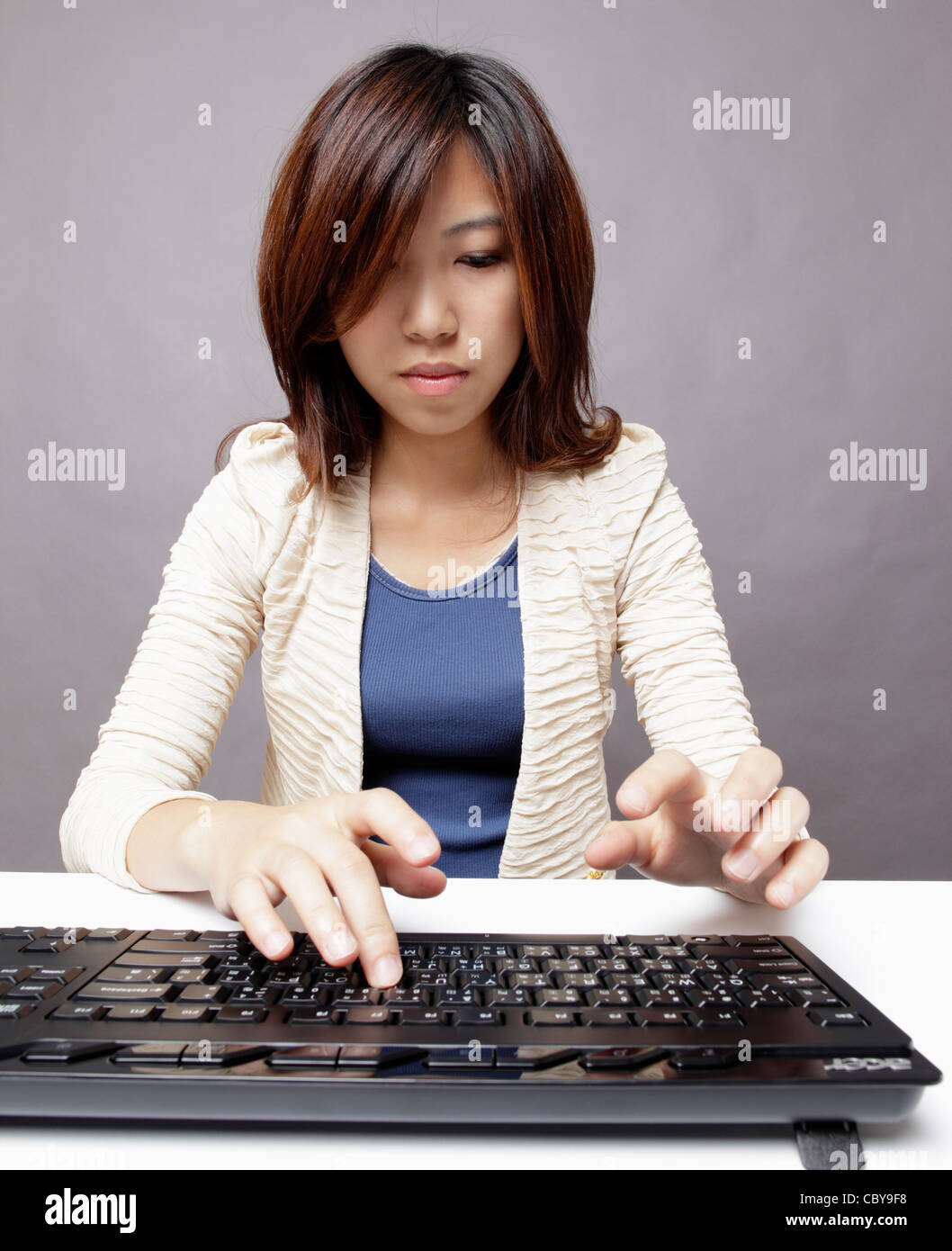 Office lady uses notebook computer Stock Photo - Alamy