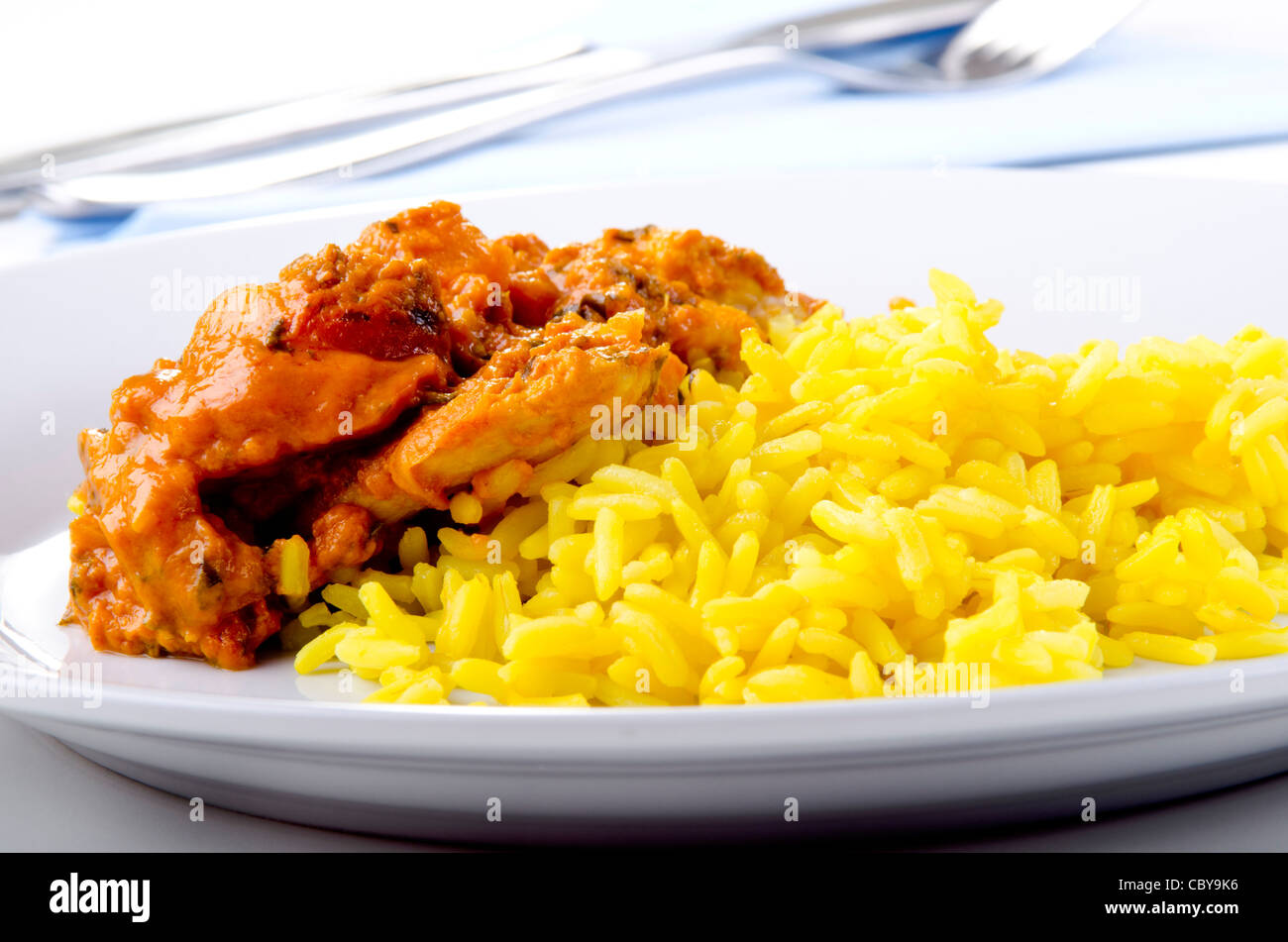 chicken tikka masala with curry rice Stock Photo - Alamy