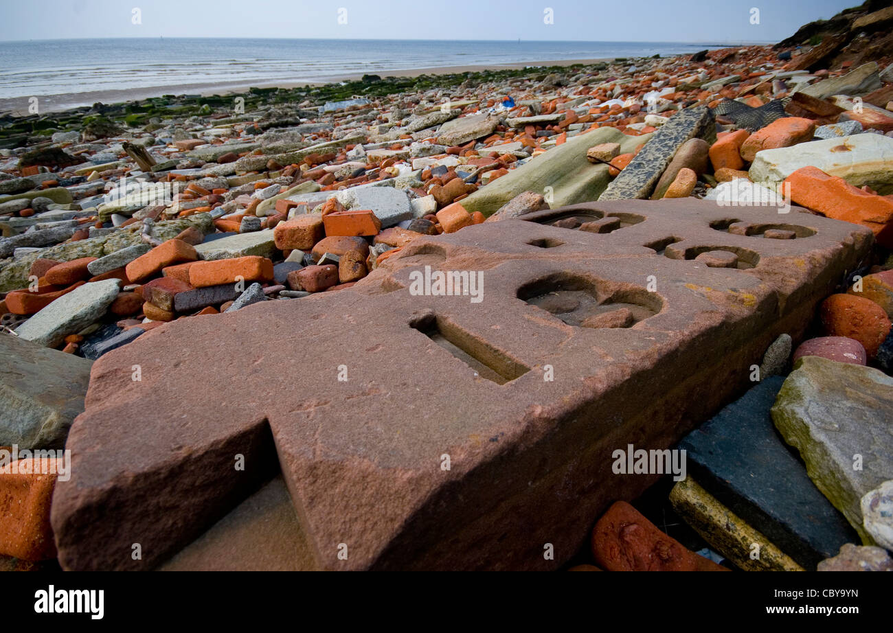 Post-war sea defence rubble on Hightown beach, Sefton coast, Merseyside ...
