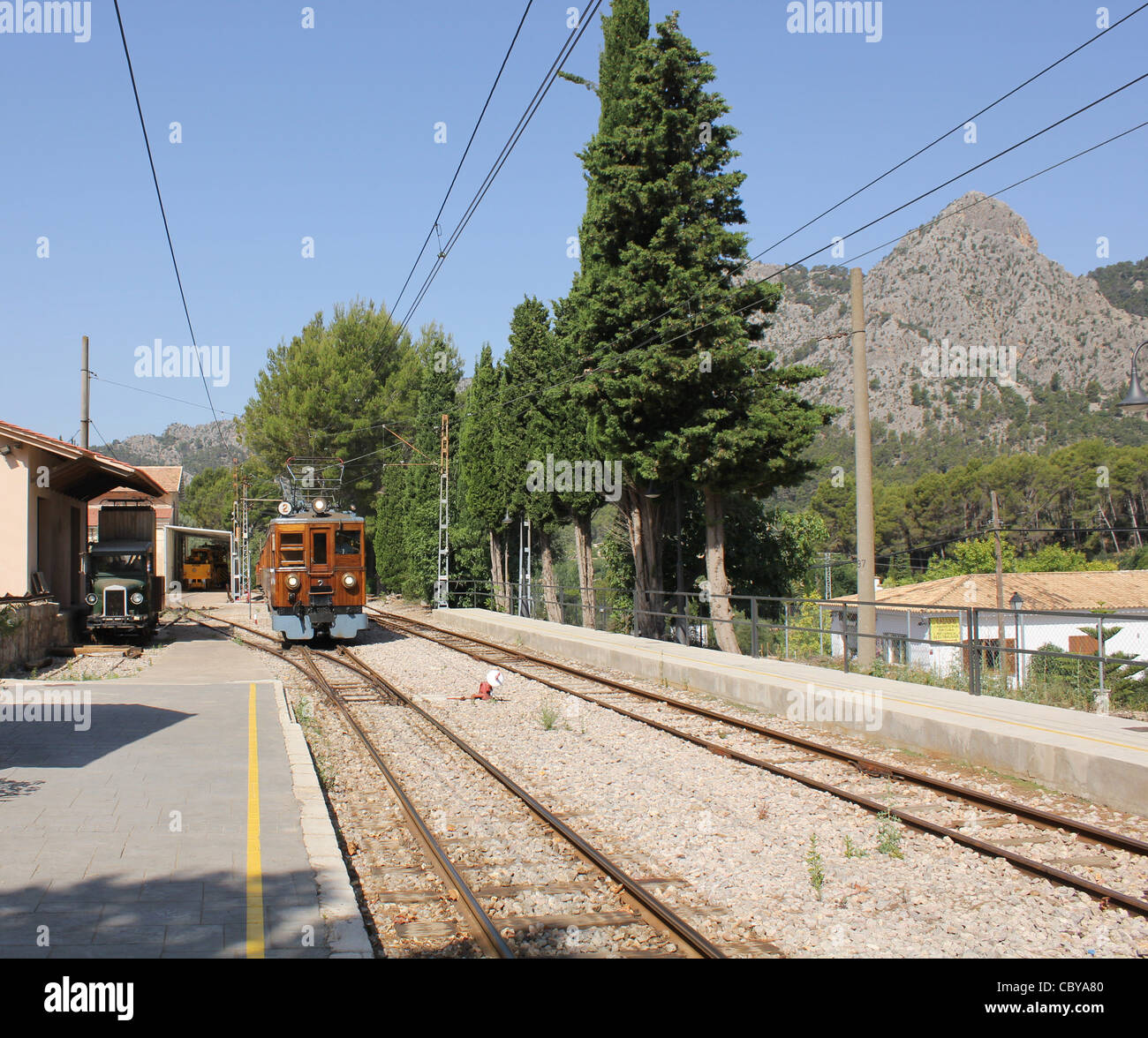 Historic palma to soller train approaching bunyola staion hi-res stock ...