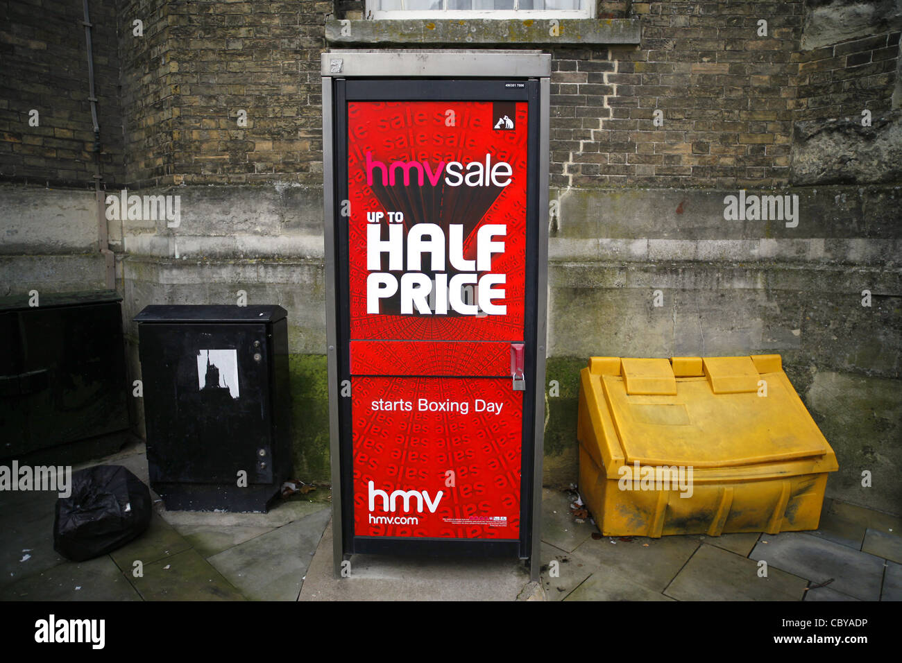 HMV sale poster on telephone kiosk Stock Photo - Alamy