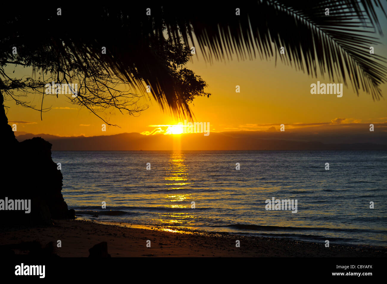 Sunrise on a beach in Costa Rica Stock Photo - Alamy