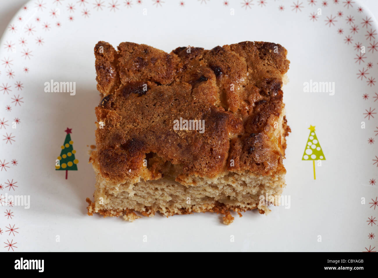 Piece of Herman German friendship cake on Christmas plate Stock Photo ...