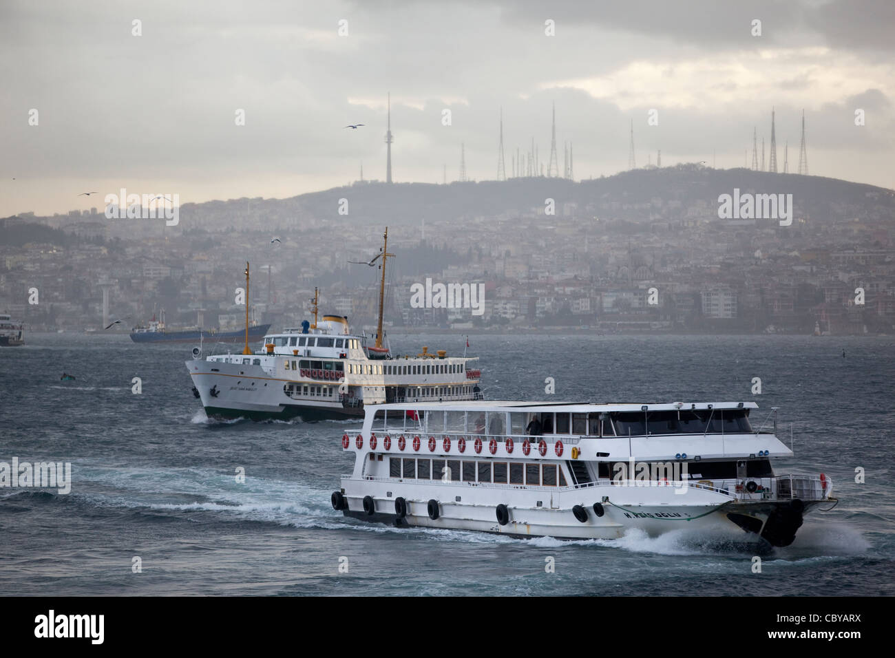 Ferry boats on the Bosphorus known as the Istanbul Strait, the boundary ...