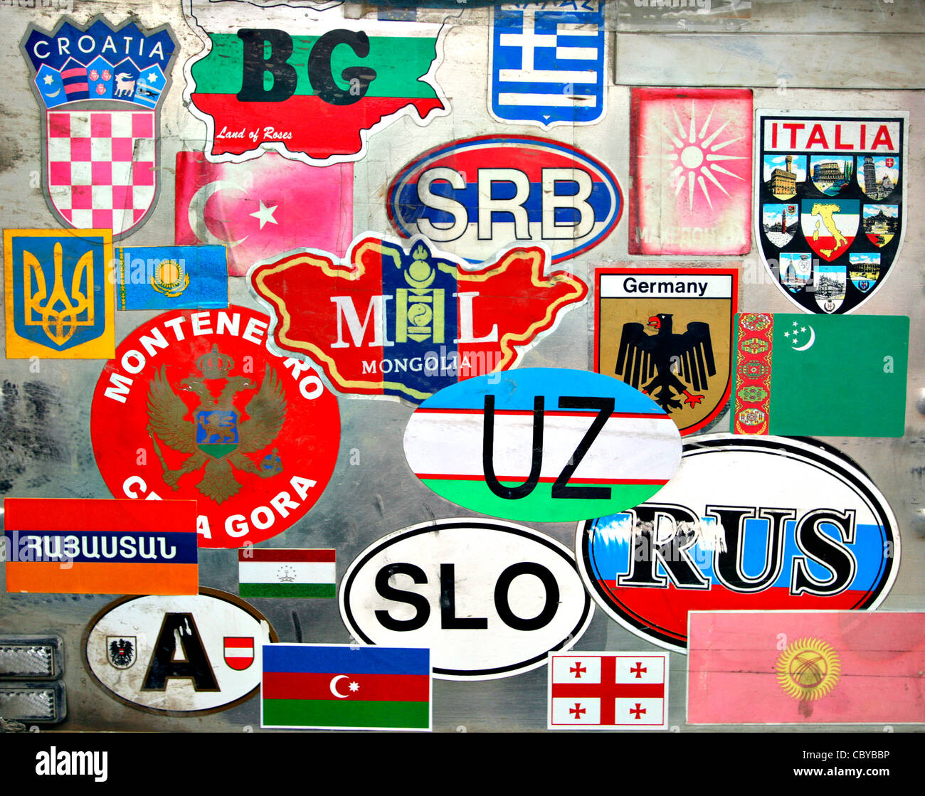 Country abbreviations stickers on a metal suitcase Stock Photo - Alamy