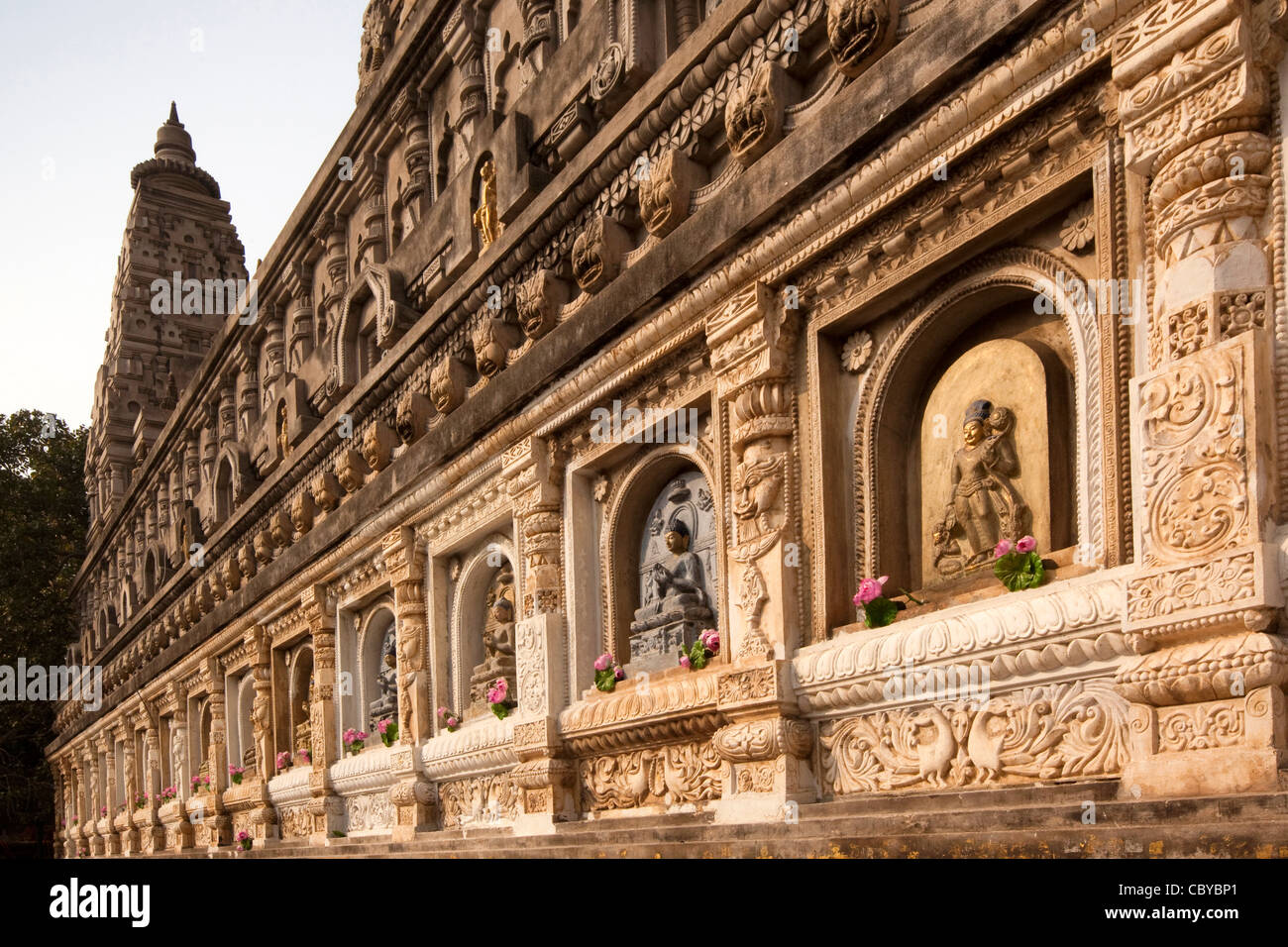 India, Bihar, Bodhgaya, Mahabodhi Temple, Buddhist sculptures on base ...