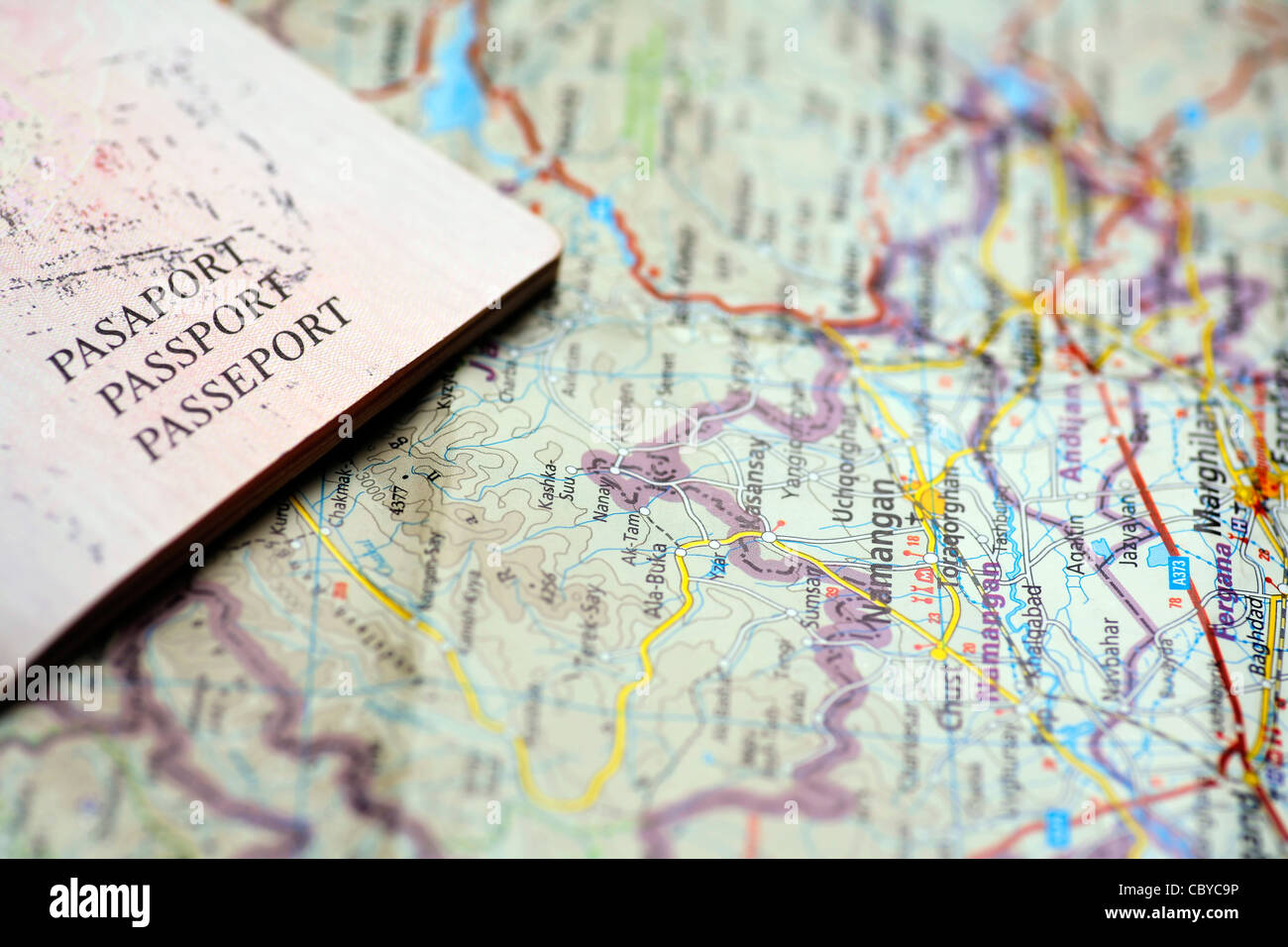 Close-up picture of a passport and a map Stock Photo - Alamy