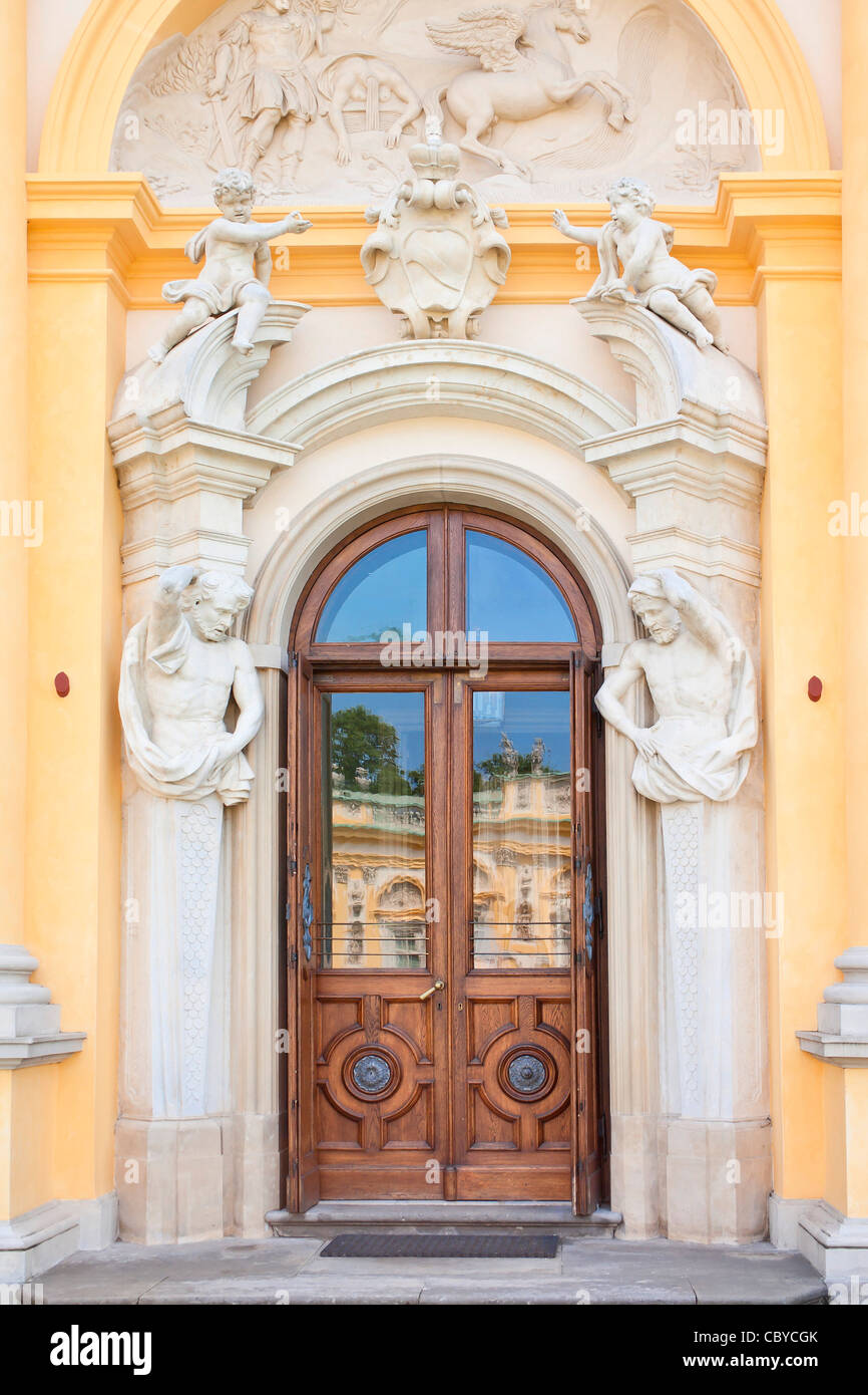 Symbols in art - Atlas. Baroque palace in Warsaw Stock Photo - Alamy