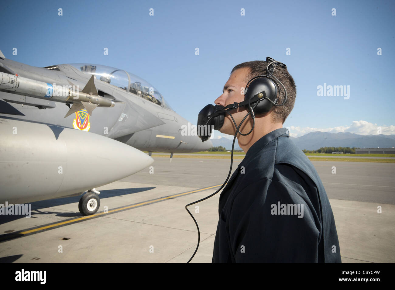 Senior Airman Kyle Wood talks to Capt. David Gunter during preflight ...