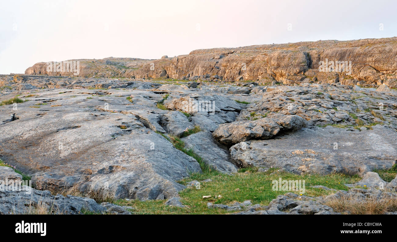 Last sun on inland cliffs at Poulsallagh, The Burren Stock Photo - Alamy