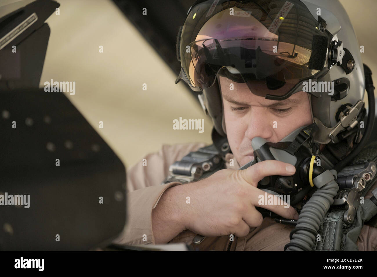 Capt. Ryan Wilmes prepares an F-16 Fighting Falcon for takeoff Oct. 18 ...