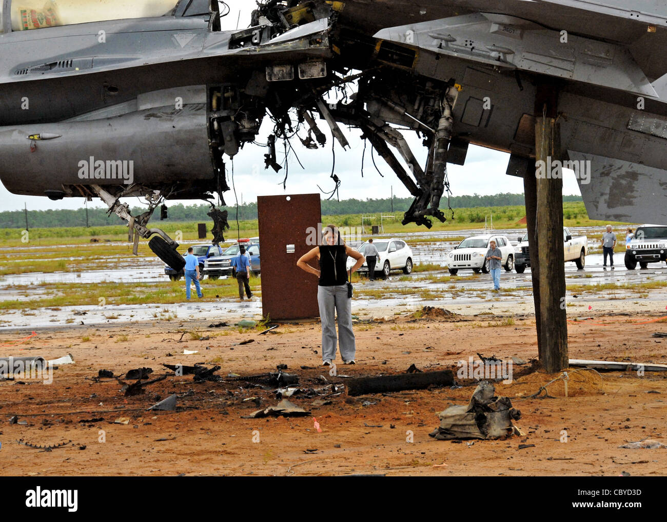 Beth Bartlett surveys the damage after the explosion of an F-16 ...