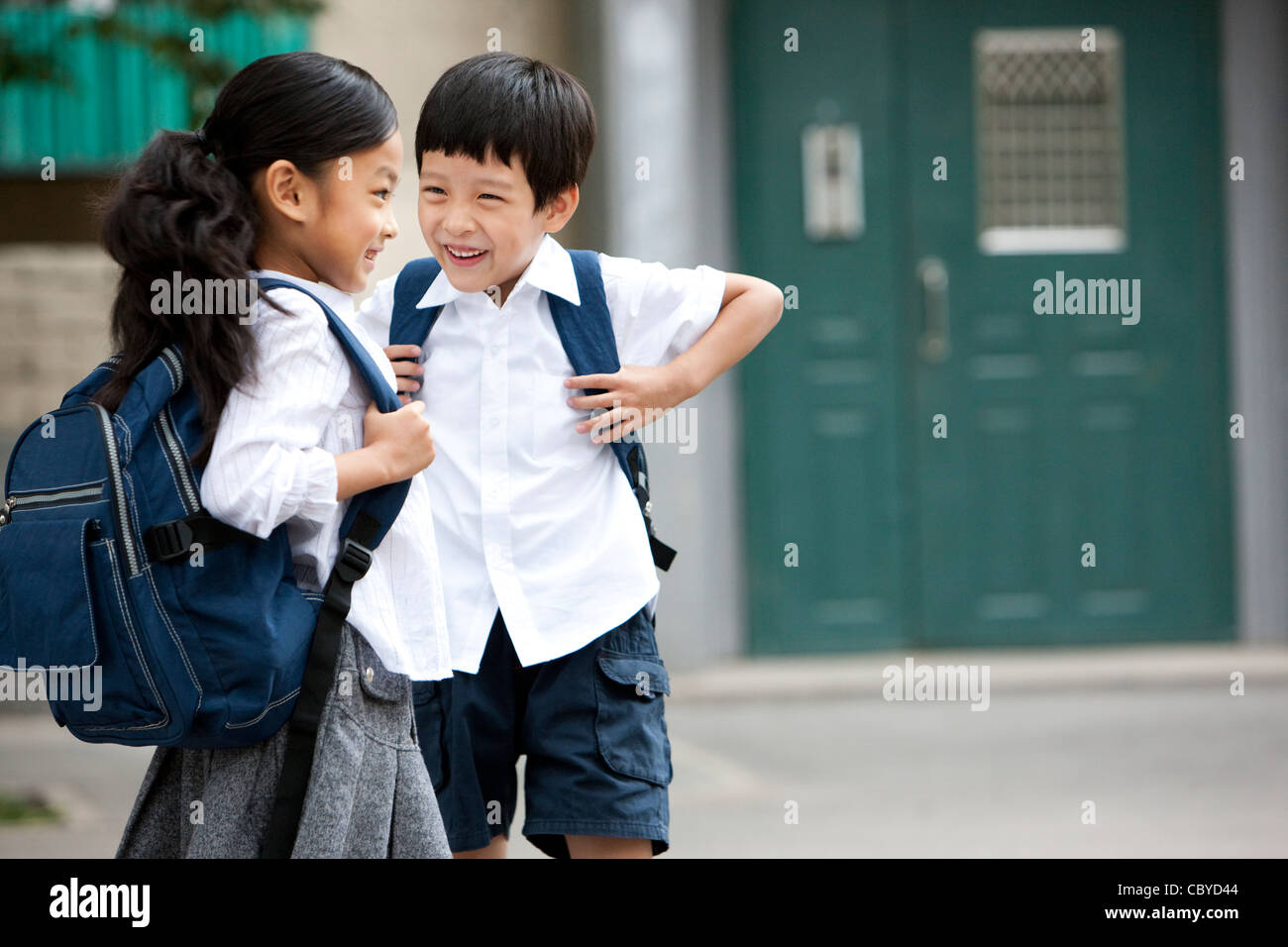 Children coming home from school Stock Photo - Alamy