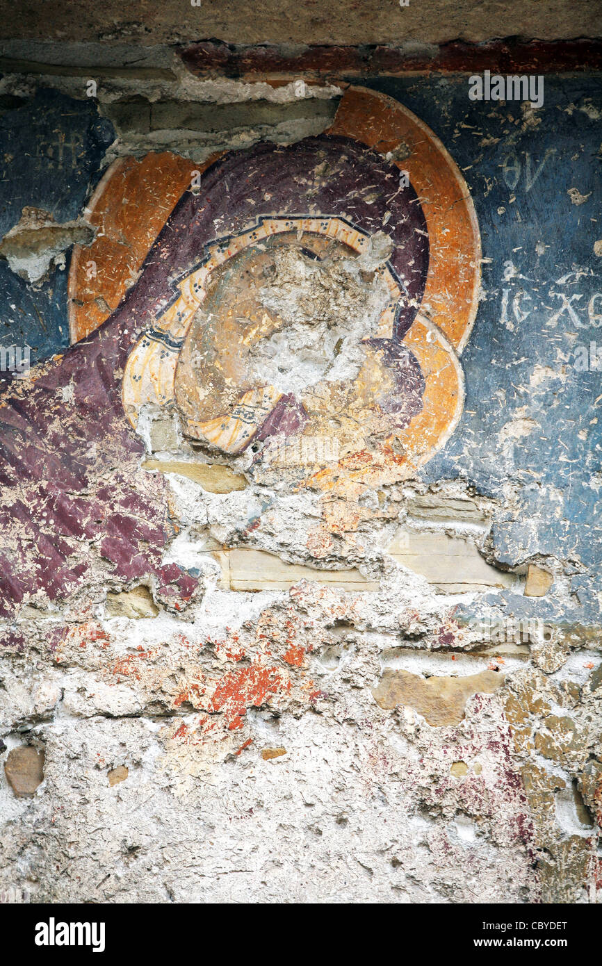 Damaged painting of Virgin Mary and child Christ on a church wall Stock ...