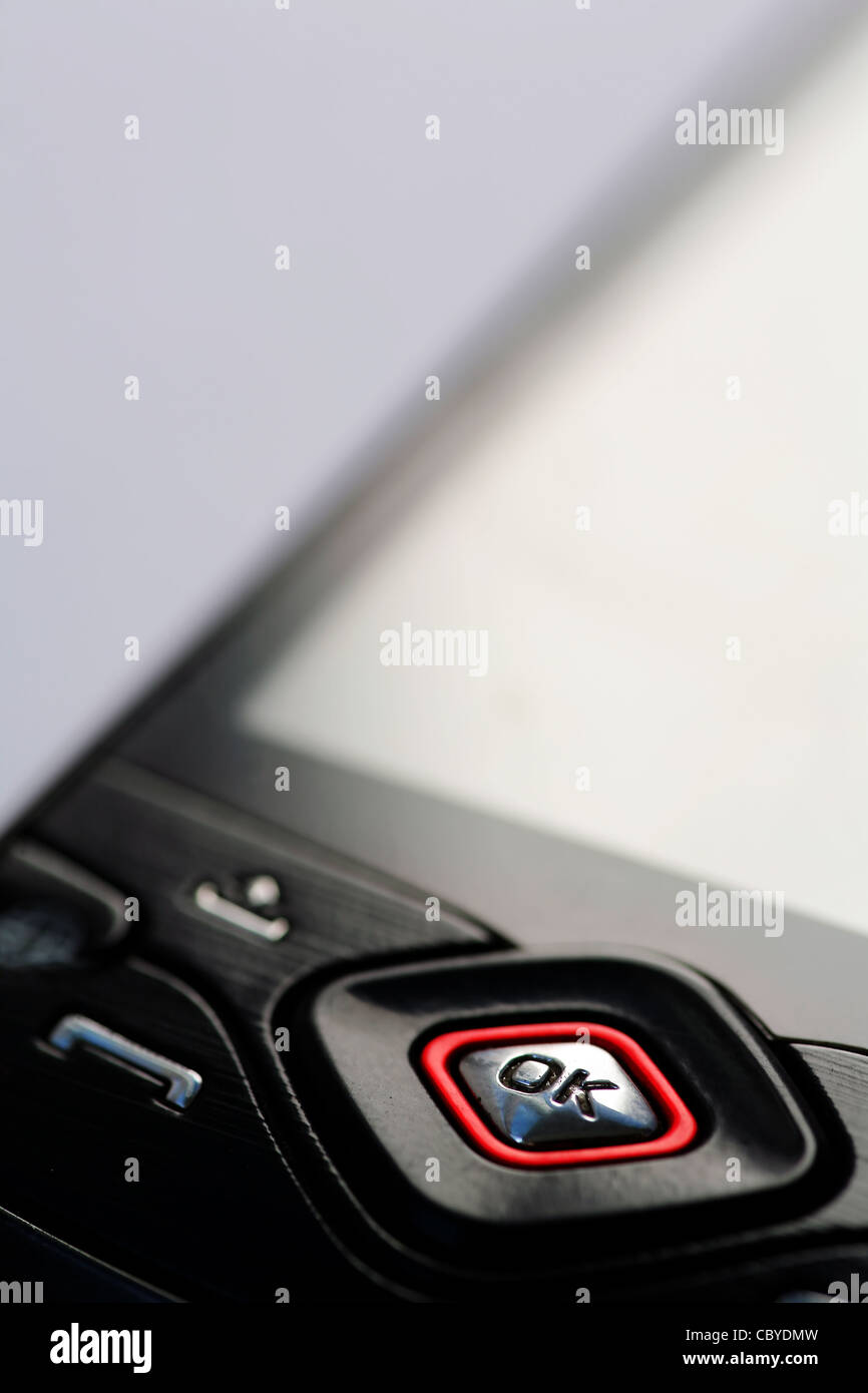 Close-up shot of the "OK" key on a cellphone's keypad Stock Photo - Alamy