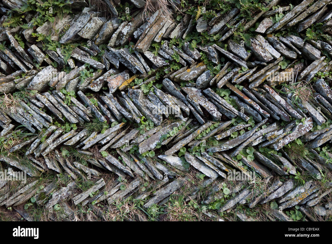 Herring bone stone wall Stock Photo - Alamy