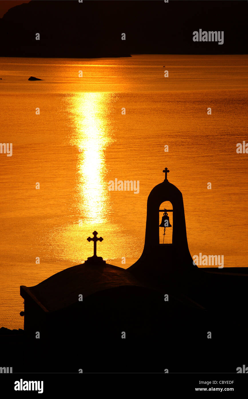 Sunset between Tinos and Andros islands, Cyclades, Greece Stock Photo ...