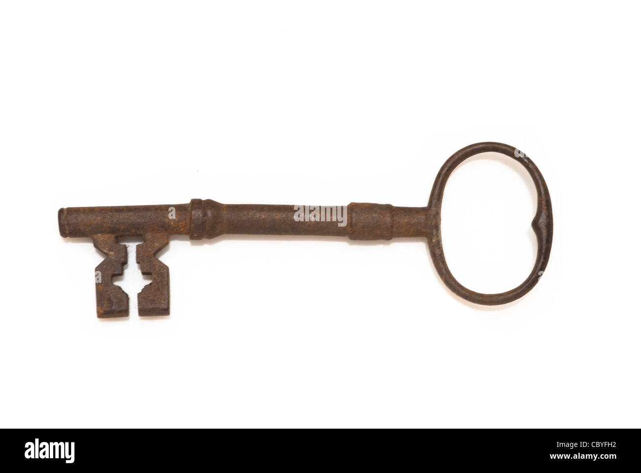 rusty old door key on white background Stock Photo - Alamy