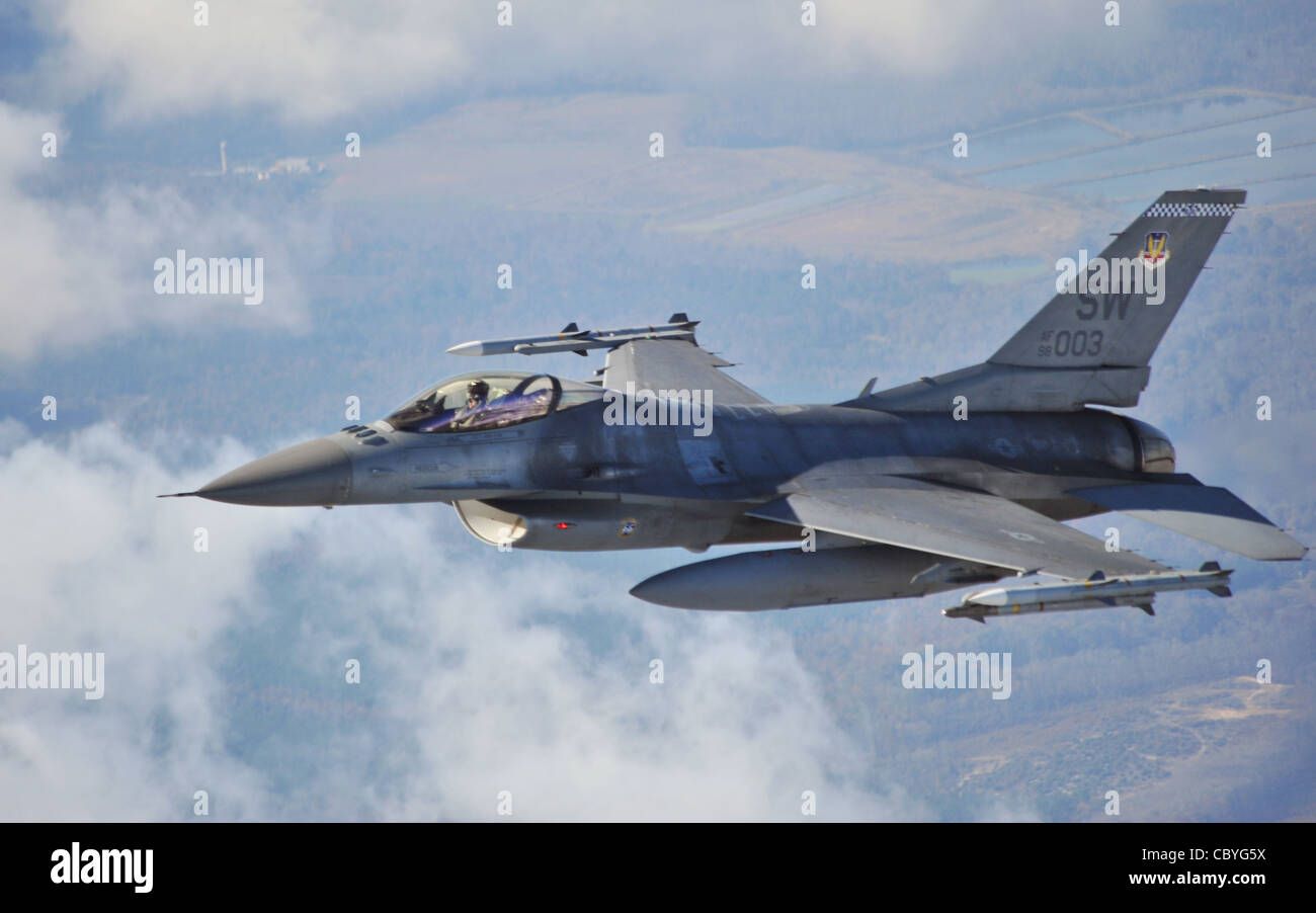 Capt. Matthew Feeman in an F-16 Fighting Falcon approaches a Cessna ...