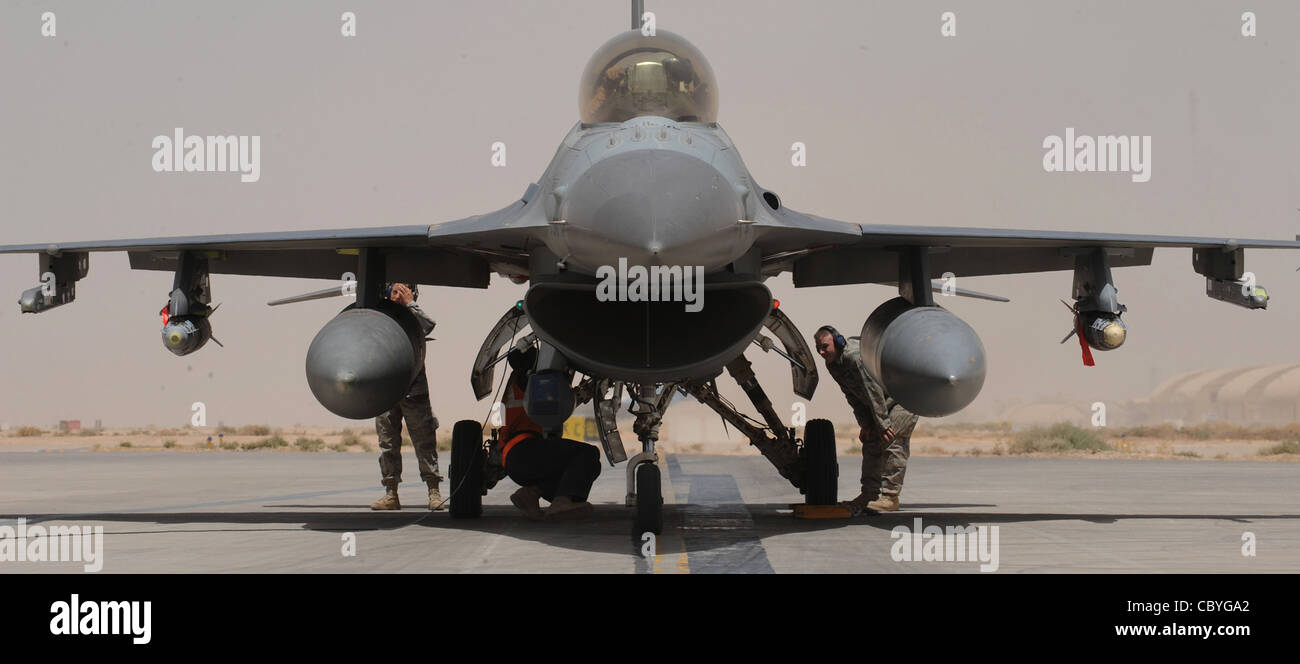 Airmen from the 332nd Expeditionary Aircraft Maintenance Squadron make ...