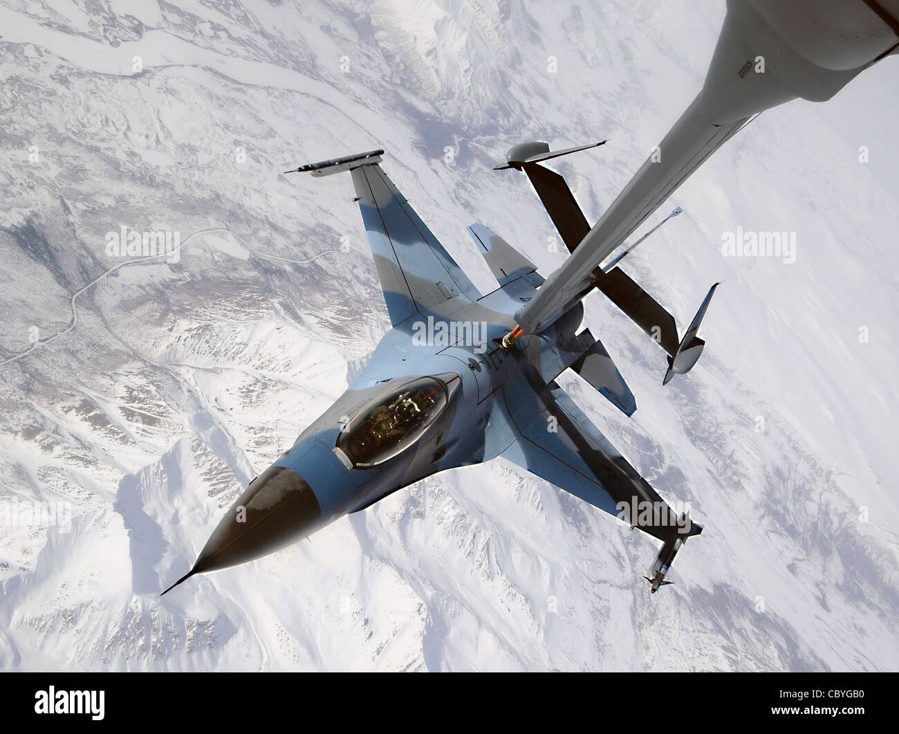An F-16 Fighting Falcon showing the aggressor paint scheme disconnects ...