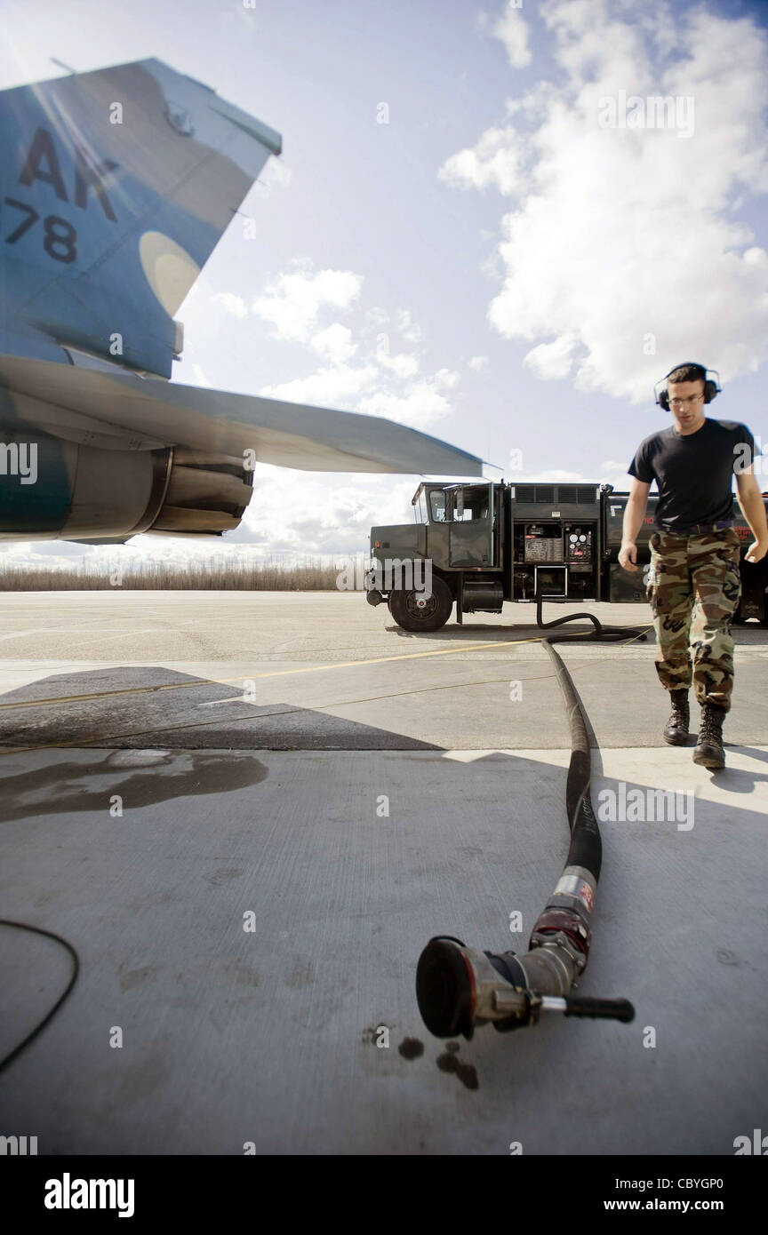 Airman 1st Class Aaron Orr prepares to fuel an F-16 Fighting Falcon May ...