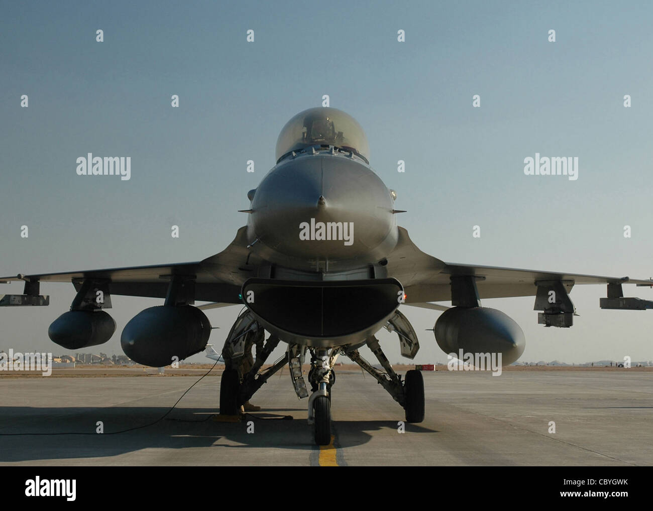 An Air Force F-16 Fighting Falcon at Balad Air Base, Iraq, waits for ...