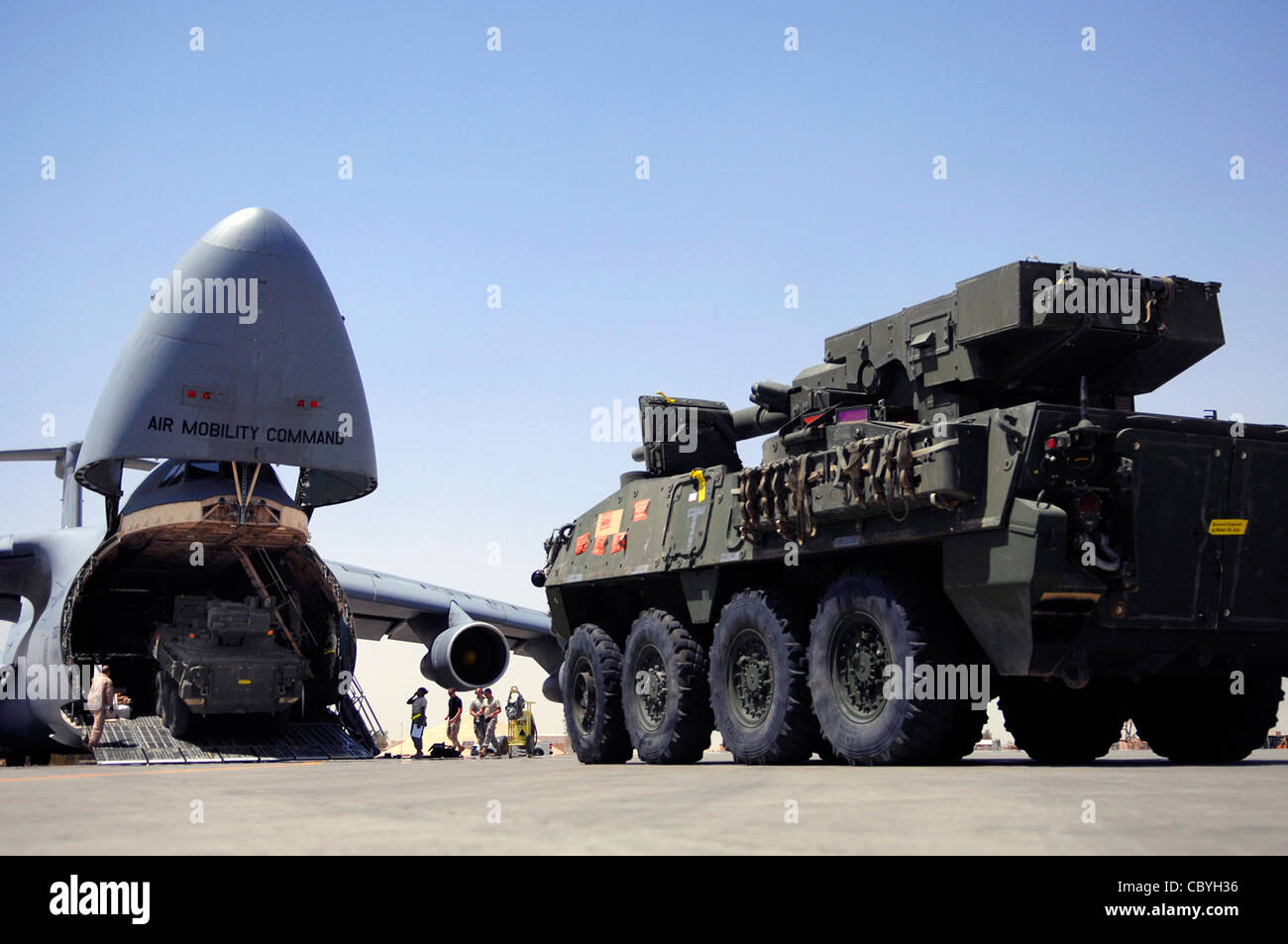 Loading cargo onto plane hi-res stock photography and images - Alamy