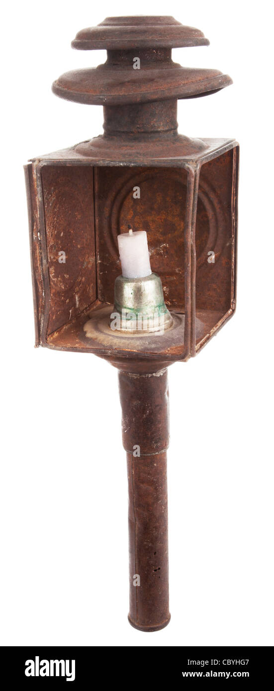 old rusty candle lamp with white background Stock Photo - Alamy