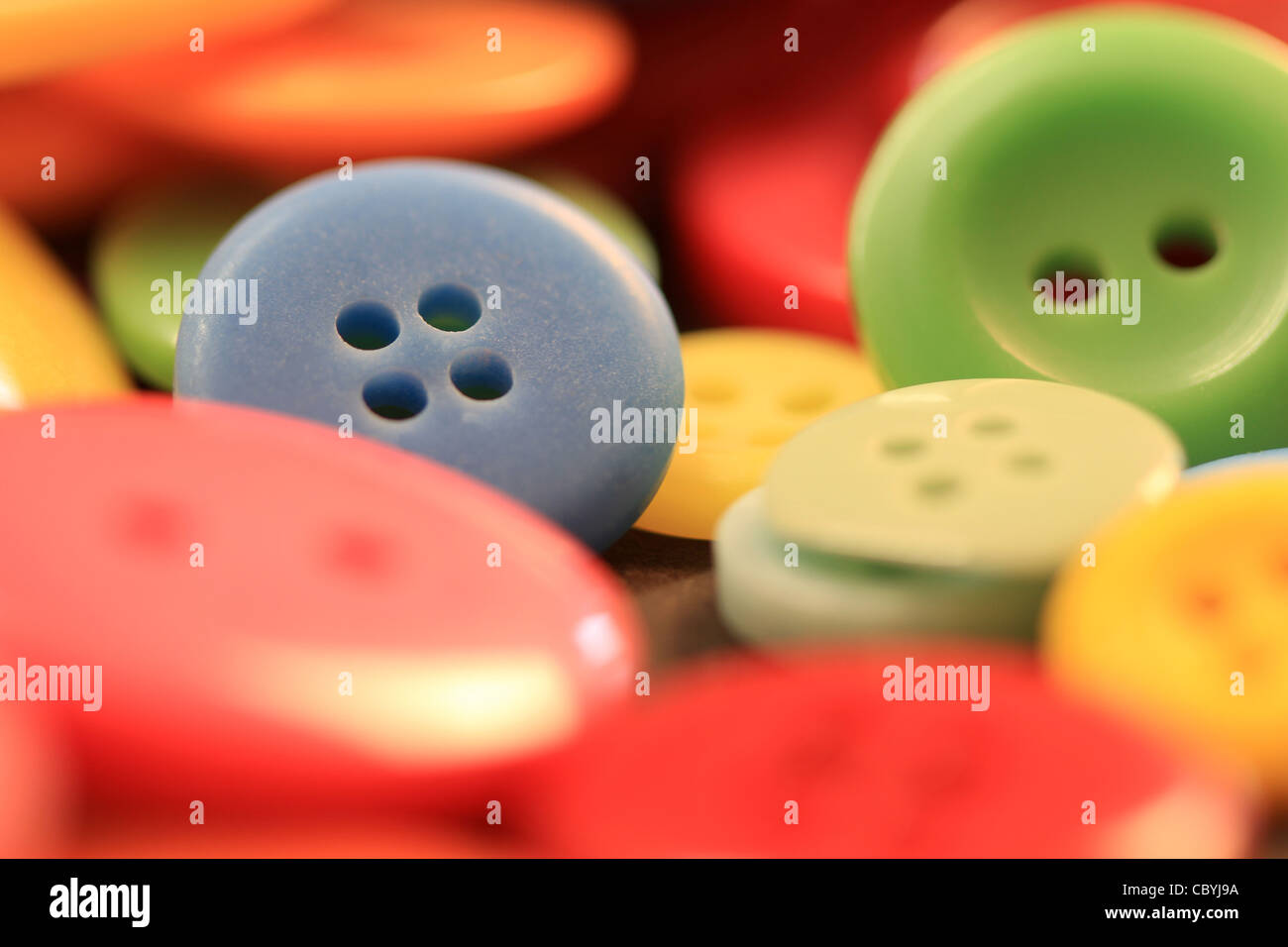 Colourful mix of buttons Stock Photo - Alamy