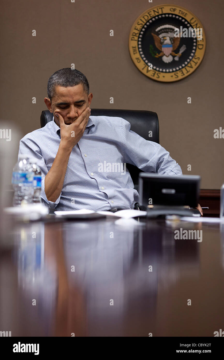 President Barack Obama listens to a conference call on Libya with this ...