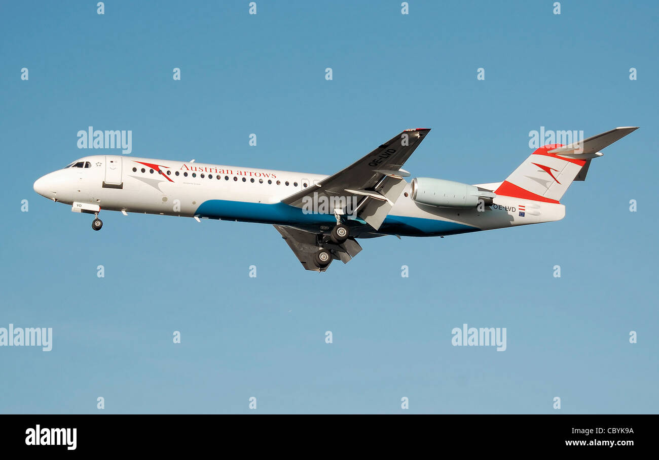 Tyrolean Airways Fokker F100 (OE-LVD) lands at London Heathrow Airport ...