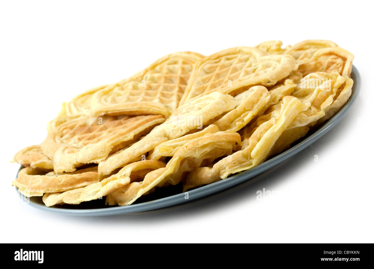 Pile of homemade golden waffles on a plate, on white Stock Photo - Alamy