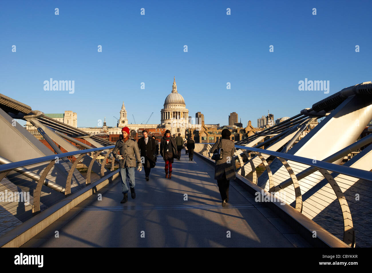 Crossing the millenium bridge hi-res stock photography and images - Alamy