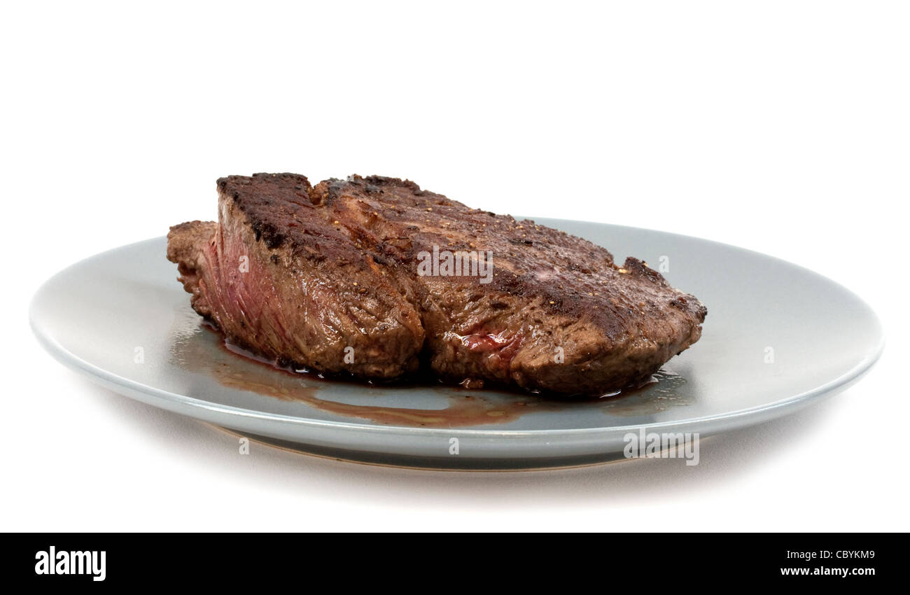 Bloody red rare entrecote isolated on white Stock Photo - Alamy