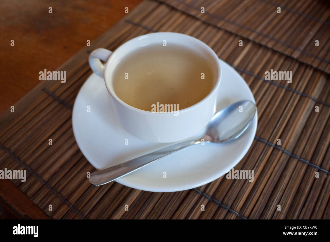 A cup of Laotian smoked green tea Stock Photo - Alamy
