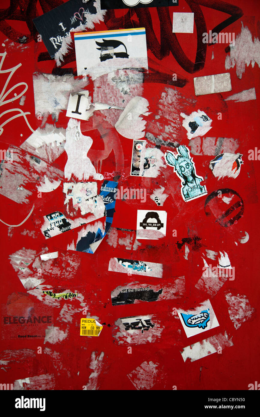 Stickers on Telephone Box in London Stock Photo - Alamy