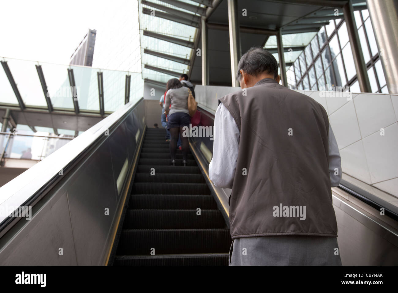 People Going Up Escalator High Resolution Stock Photography and Images ...