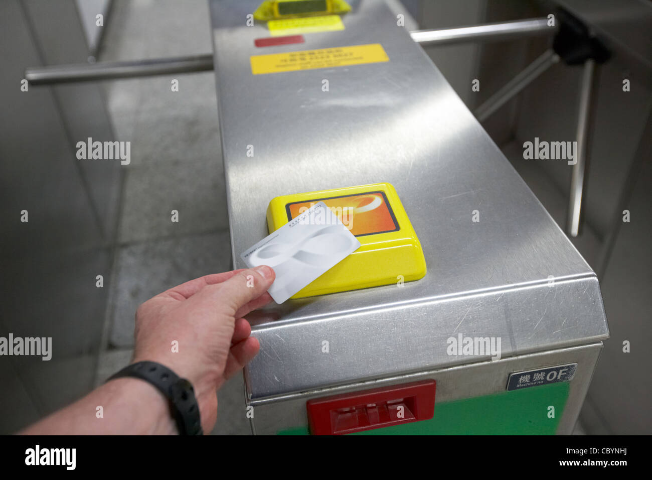 caucasian male tourist using octopus card on public transport mtr hong ...