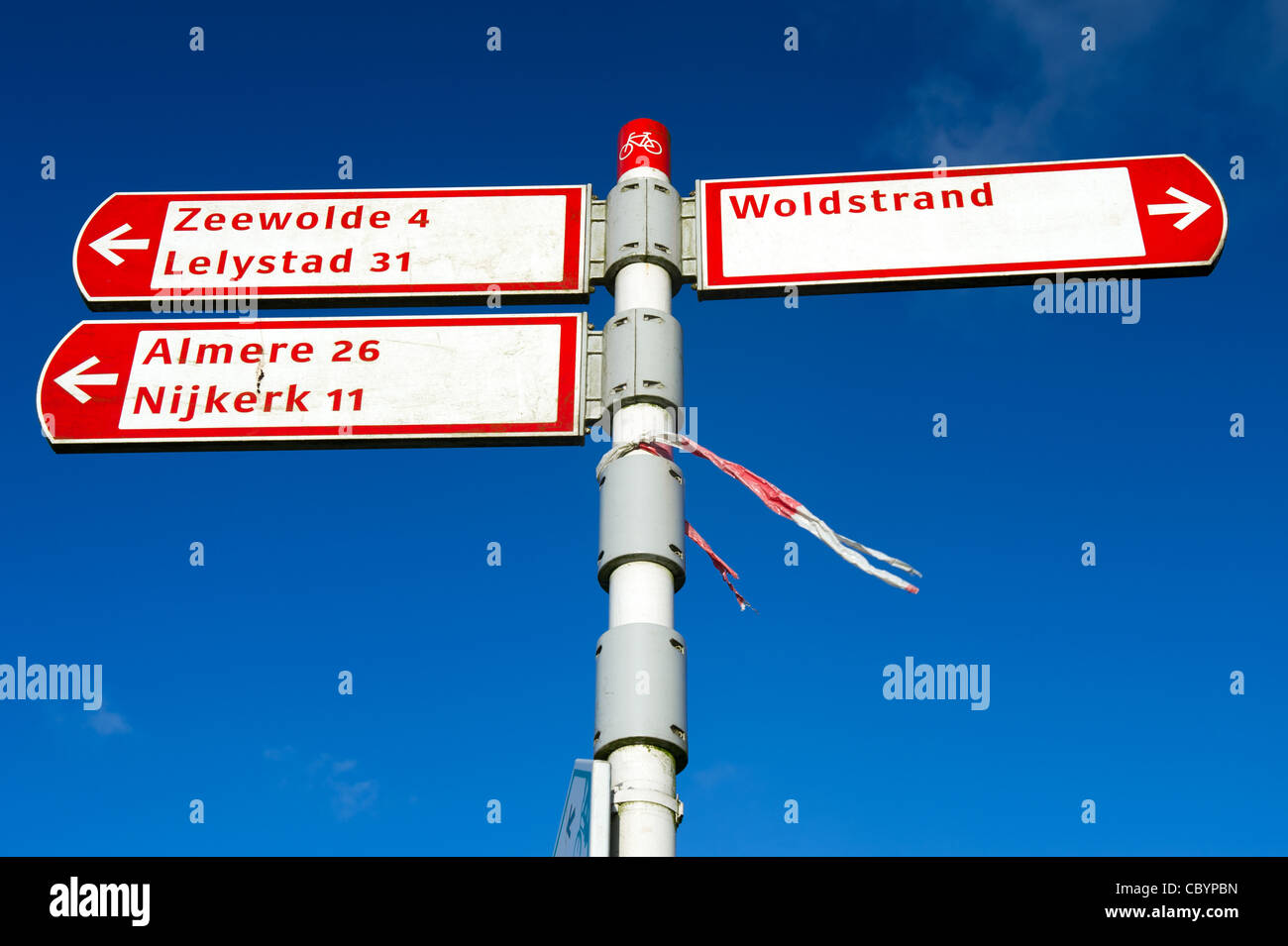 Pointing direction sign in Holland Stock Photo - Alamy