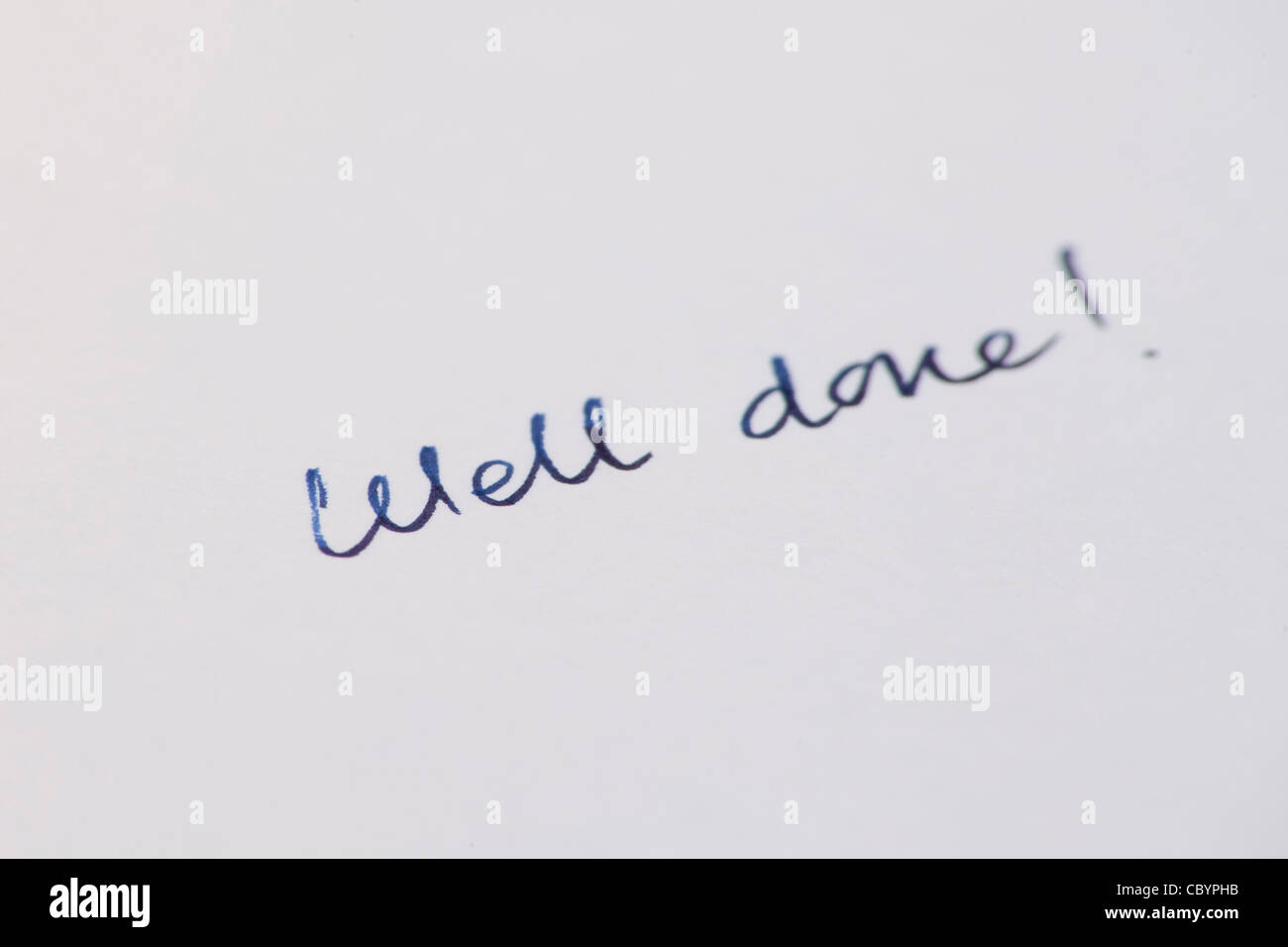 the words "well done!" handwritten in ink Stock Photo - Alamy