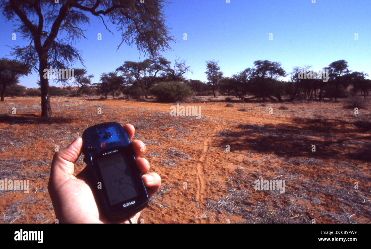 Using a GPS device in the bush in Namibia Stock Photo - Alamy