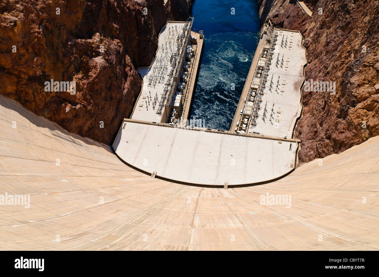 Looking down from the top of the massive concrete wall of the Hoover ...