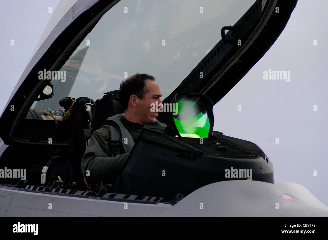 Lt. Col. Orlando Sanchez removes his helmet after arriving with his F ...