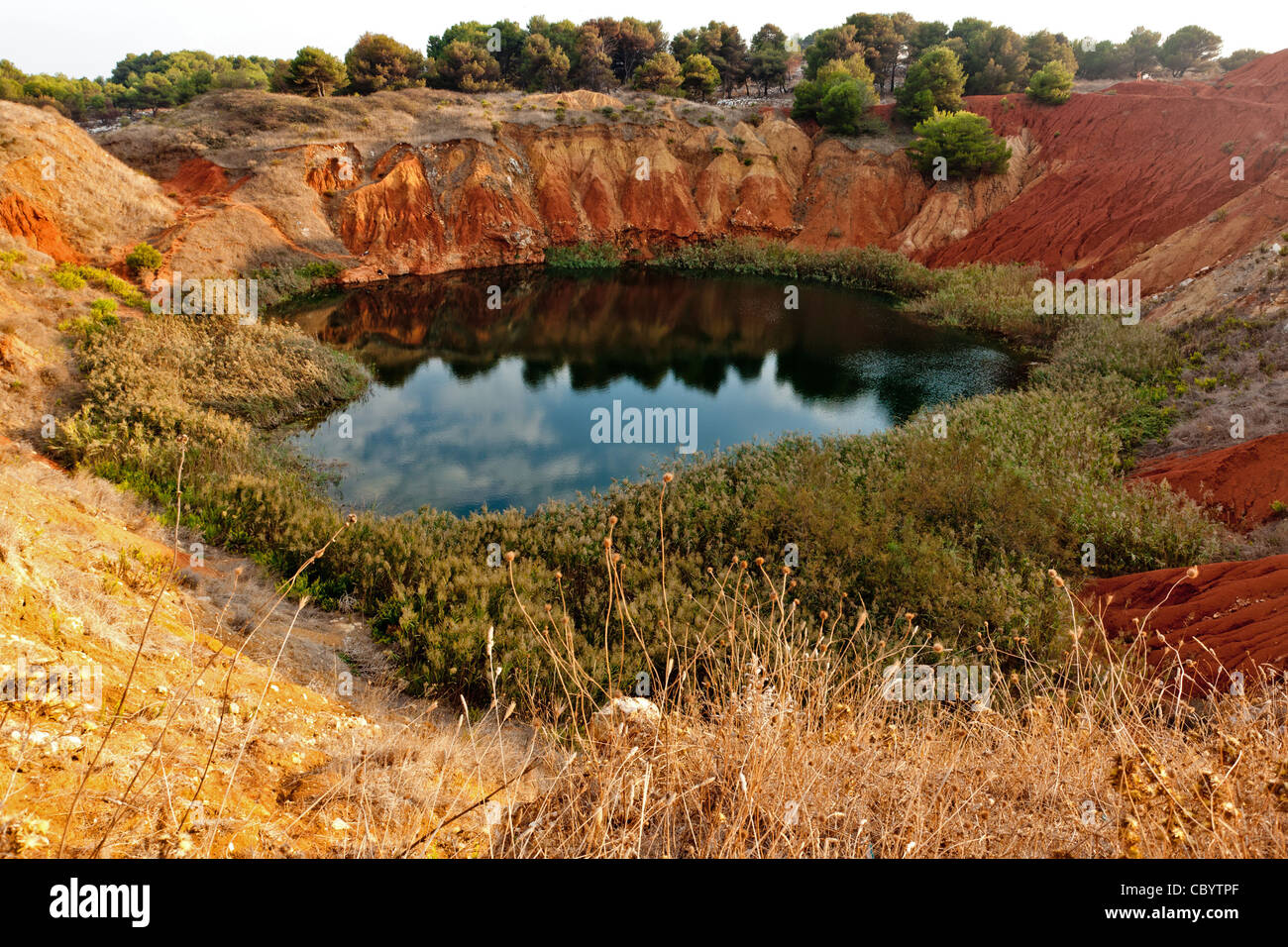 ABANDONED BAUXITE QUARRY, OTRANTO, PUGLIA, ITALY Stock Photo - Alamy