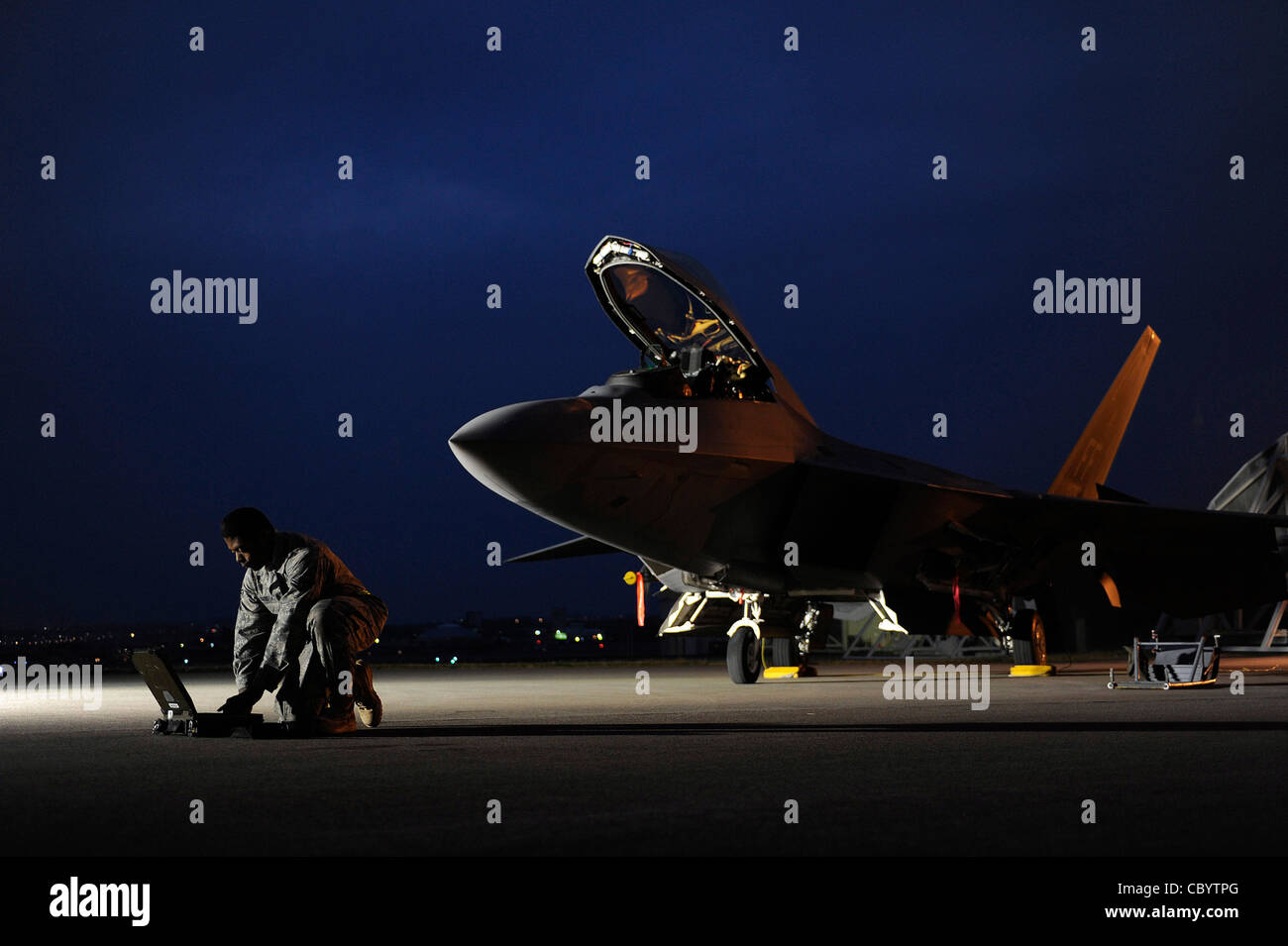 Airman 1st Class Aaron Tate inputs data into his portable maintenance ...