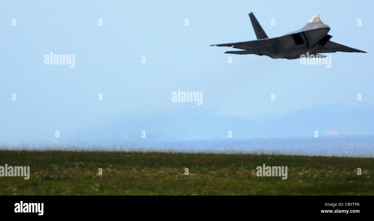 An F-22 Raptor takes off for a mission Jan. 14 at Kadena Air Base ...